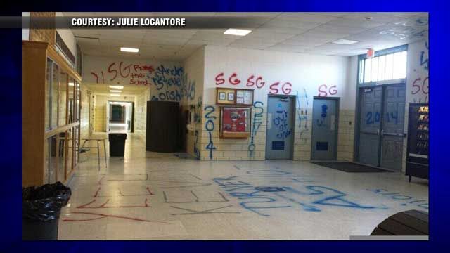 Seniors spray paint inside Harwich High School - 7News Boston WHDH-TV